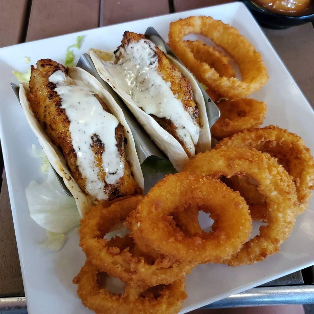The Yucatan Beach Stand menu in Fort Myers Beach, Florida, USA